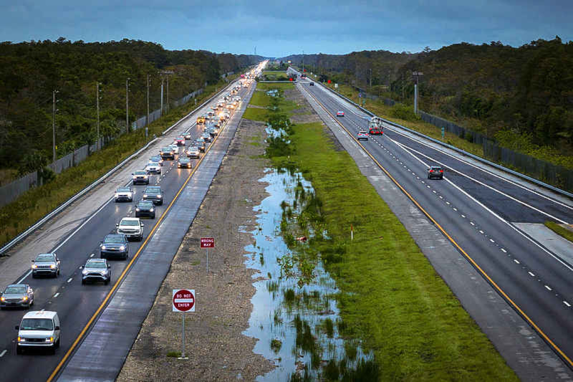 The Daily Herald - Thousands flee Hurricane Milton, causing traffic ...