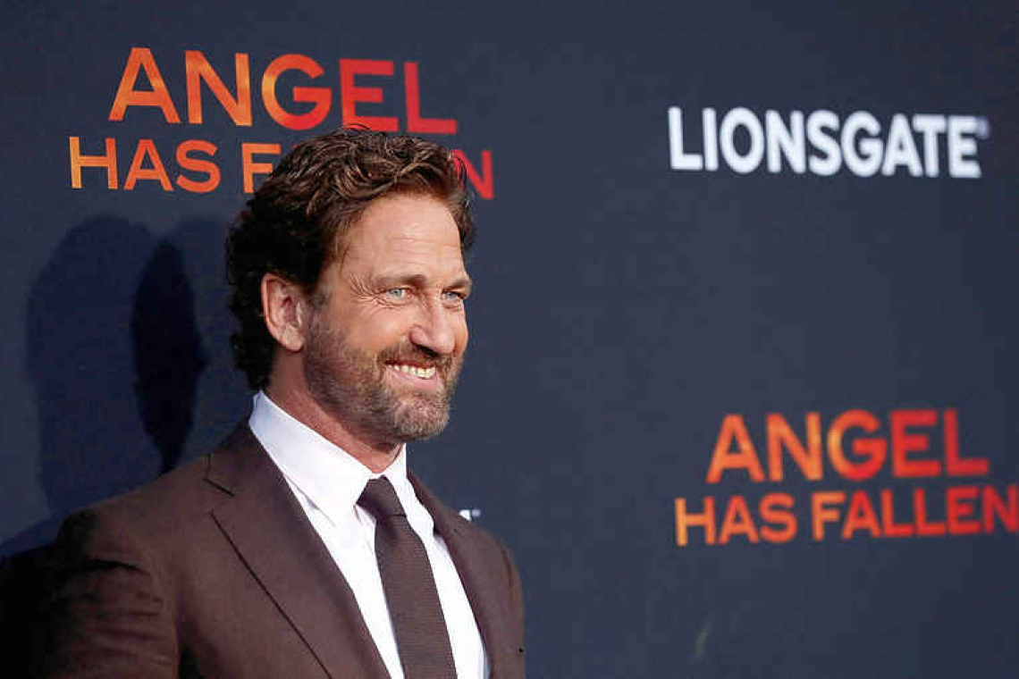 The Daily Herald - Butler goes from action hero to singing Santa in ...